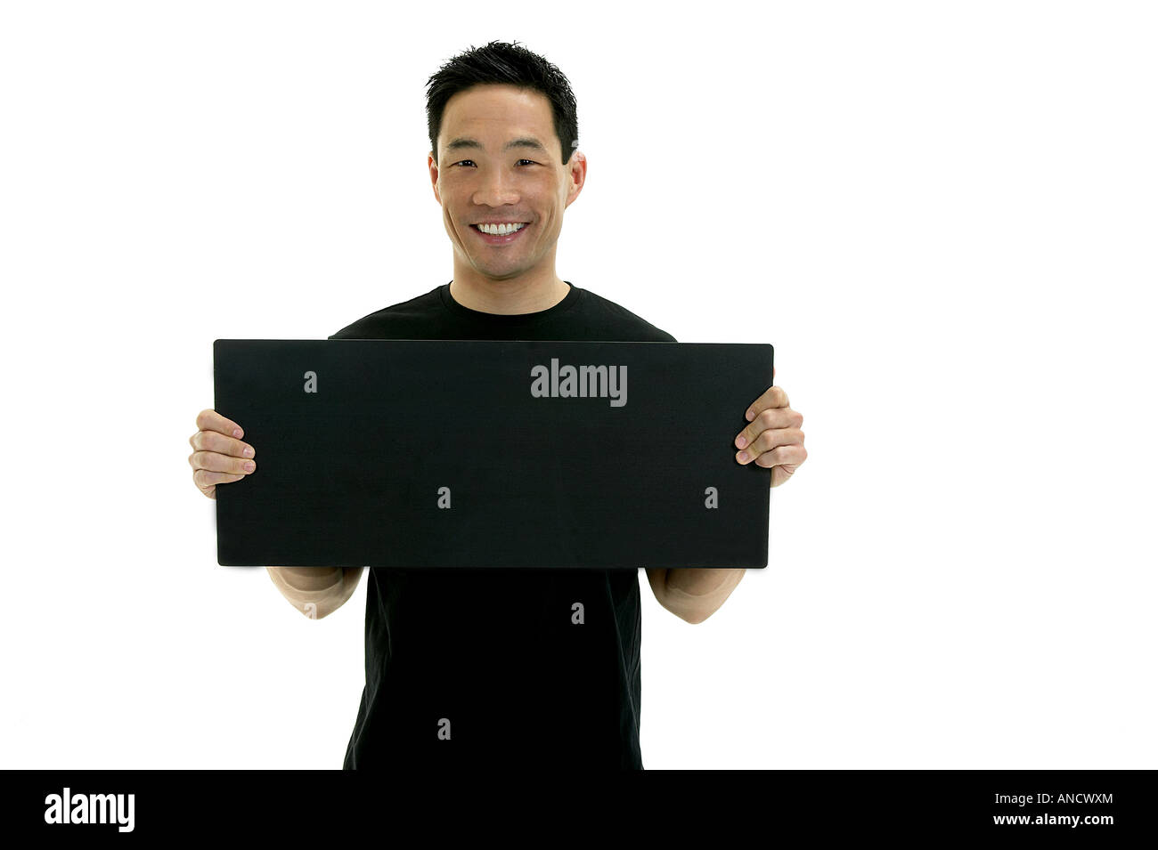 Man Holding Black Sign Stock Photo - Alamy