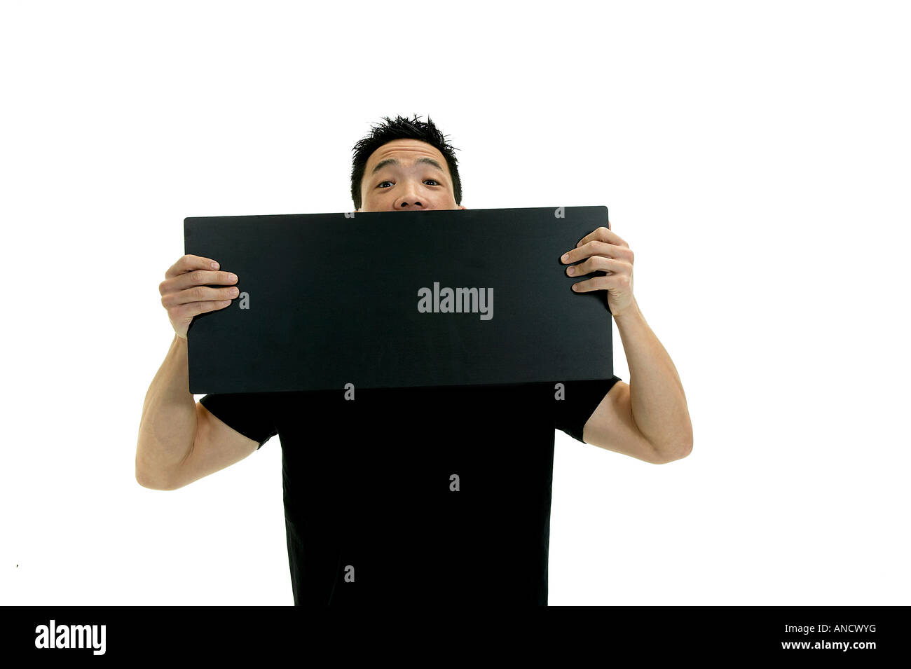 Man Holding Blank Black Sign Stock Photo - Alamy
