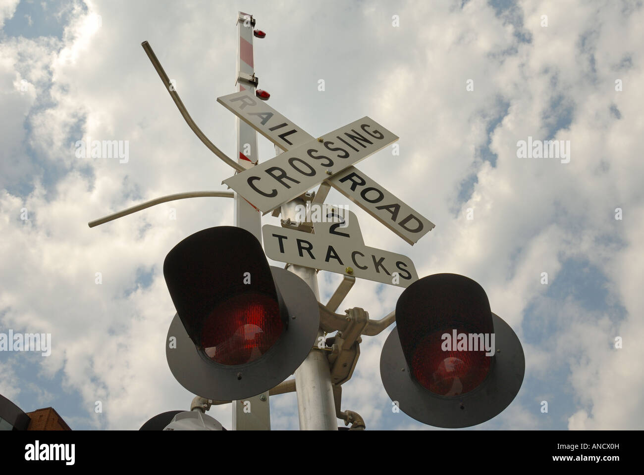 Rail Road Crossing guard agains sky Stock Photo - Alamy
