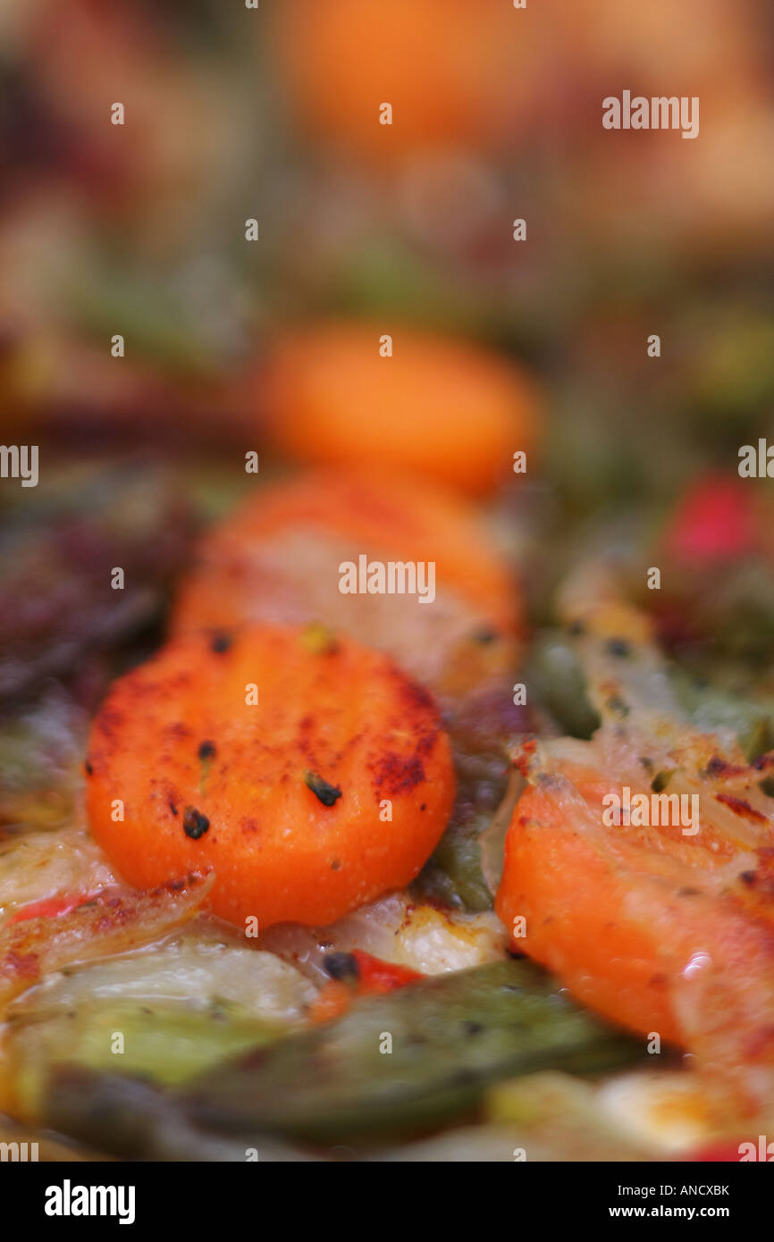 Baked fish with carrots and other vegetables Stock Photo - Alamy