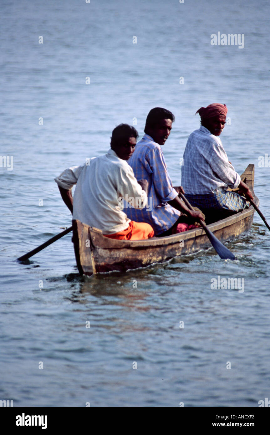 Men in canoe, Backwaters, Kerala, India Stock Photo - Alamy