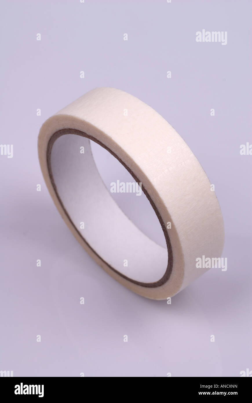 close up of a roll of masking tape on white background Stock Photo - Alamy