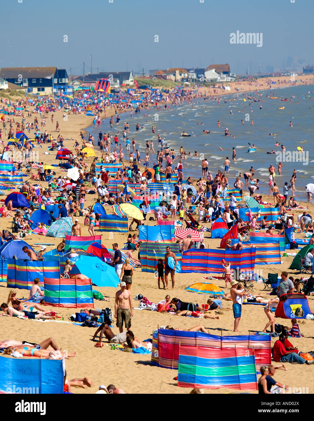 The crowded beach of Camber Sands in the height of the summer holiday ...
