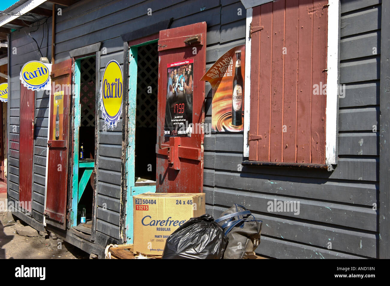 Outside of a run down pub with garbage sitting outside, Grenada ...