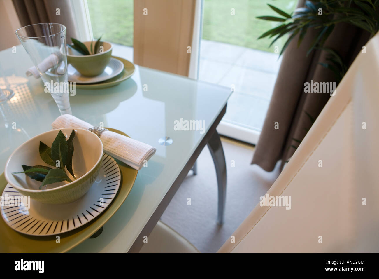 TABLE SET IN A MODERN HOME Stock Photo - Alamy
