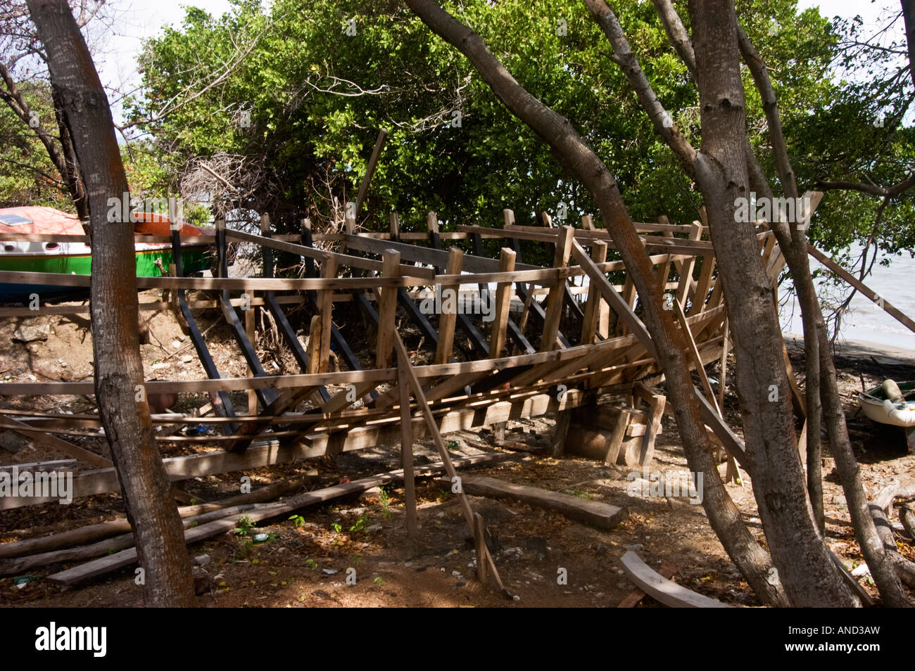 The wooden skeleton of the hull of a boat under construction in the ...