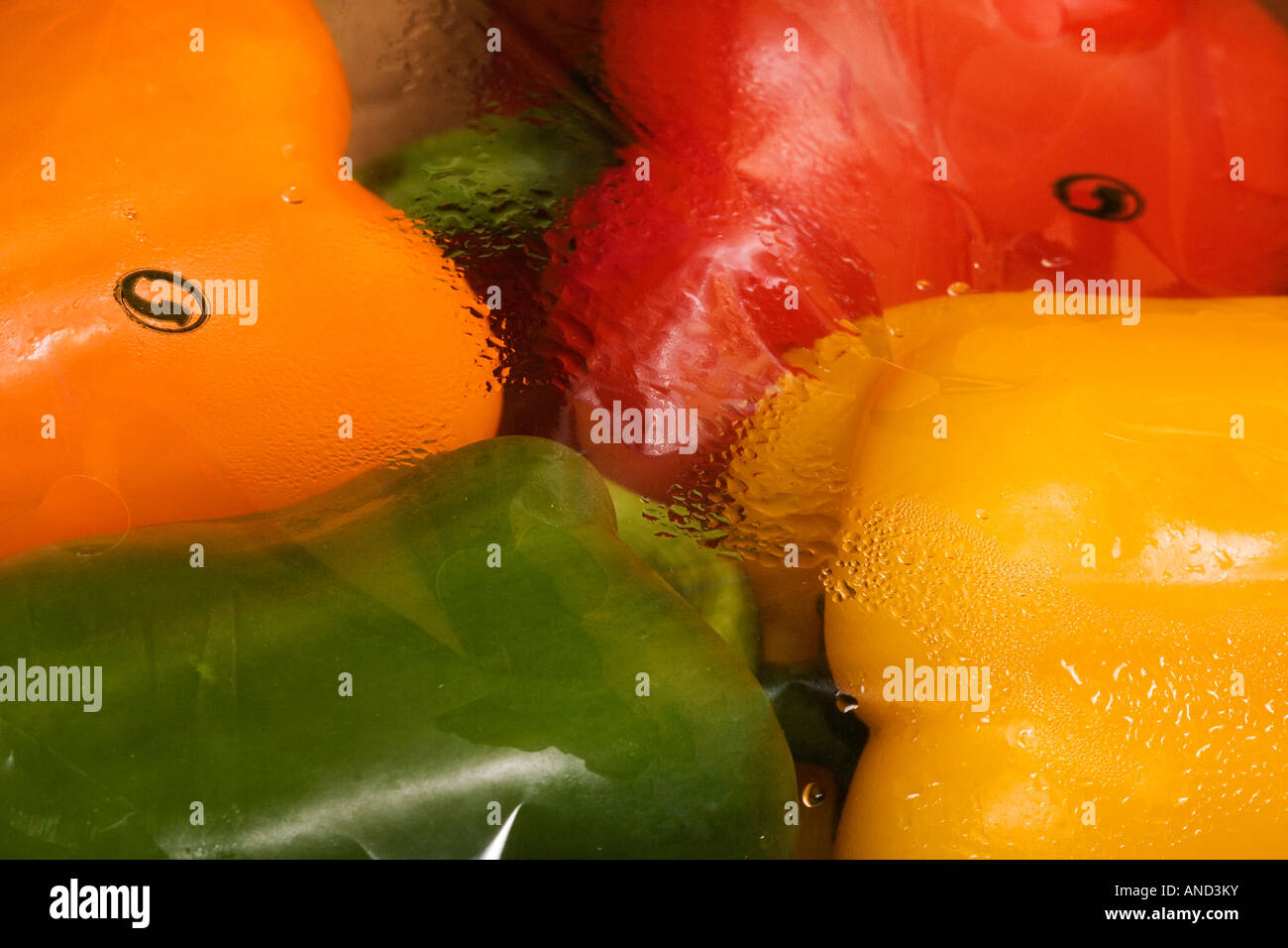 Bell peppers in plastic wrapping December 2007 Stock Photo - Alamy