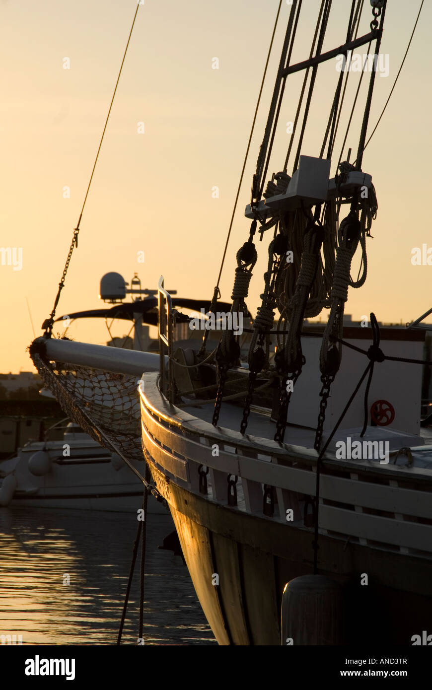 Bow of a sailingboat at sunset Stock Photo - Alamy