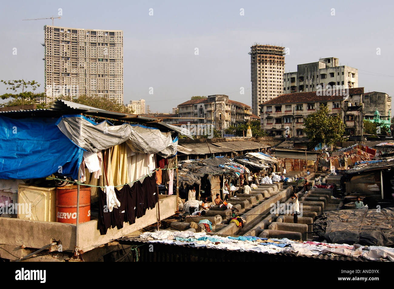 Overview of the Dhobi Ghat open air laundry with rising skyscrapers in ...