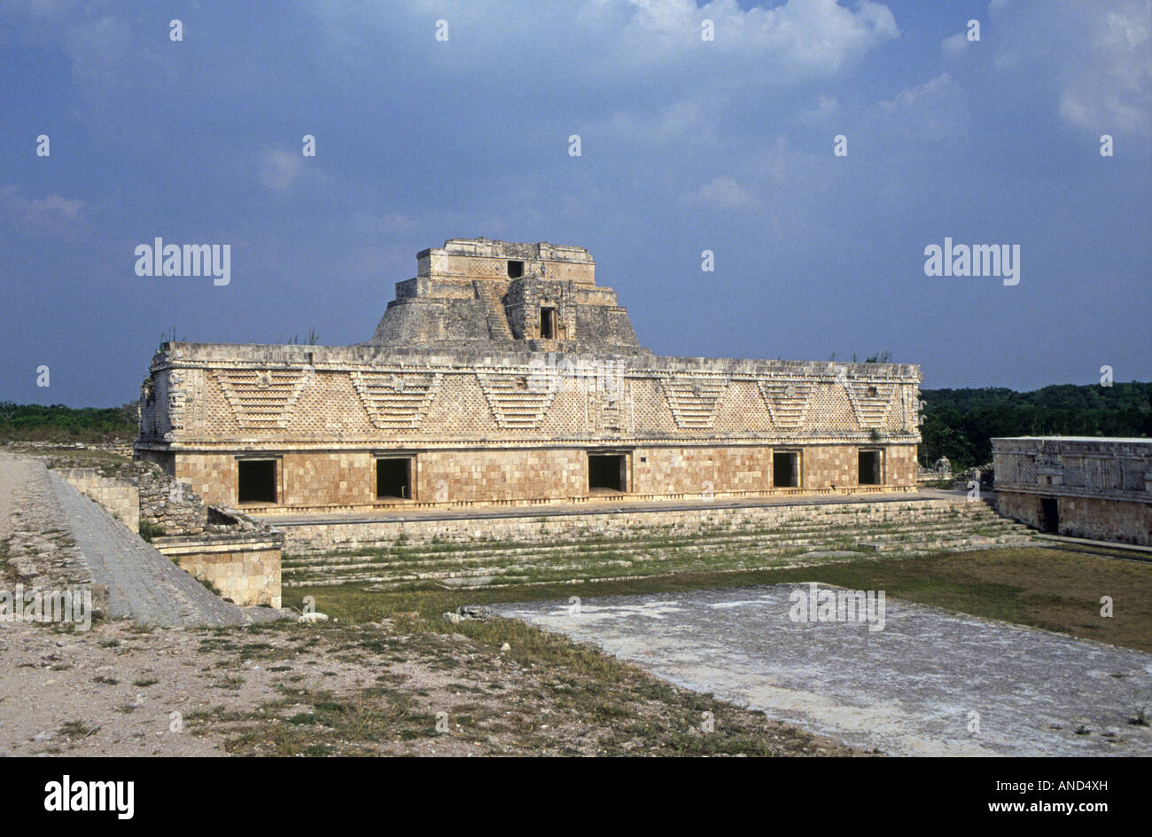 The ancient ball court and the main pyramid or temple at Uxmal an ...