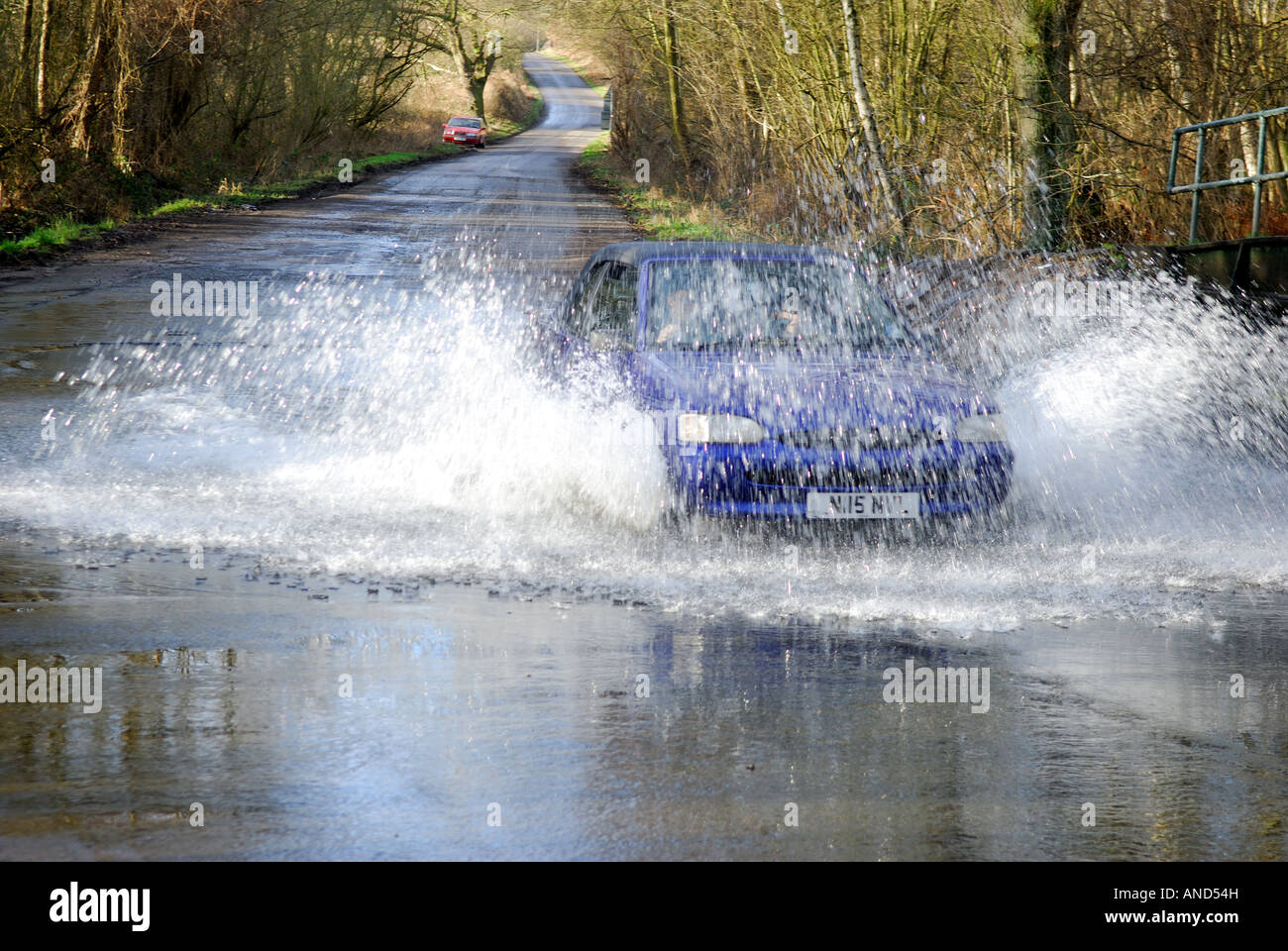 Car passes through ford Stock Photo - Alamy