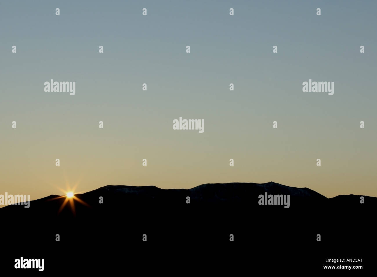 Sunset over the mountain of Lochnagar on the Balmoral estate ...
