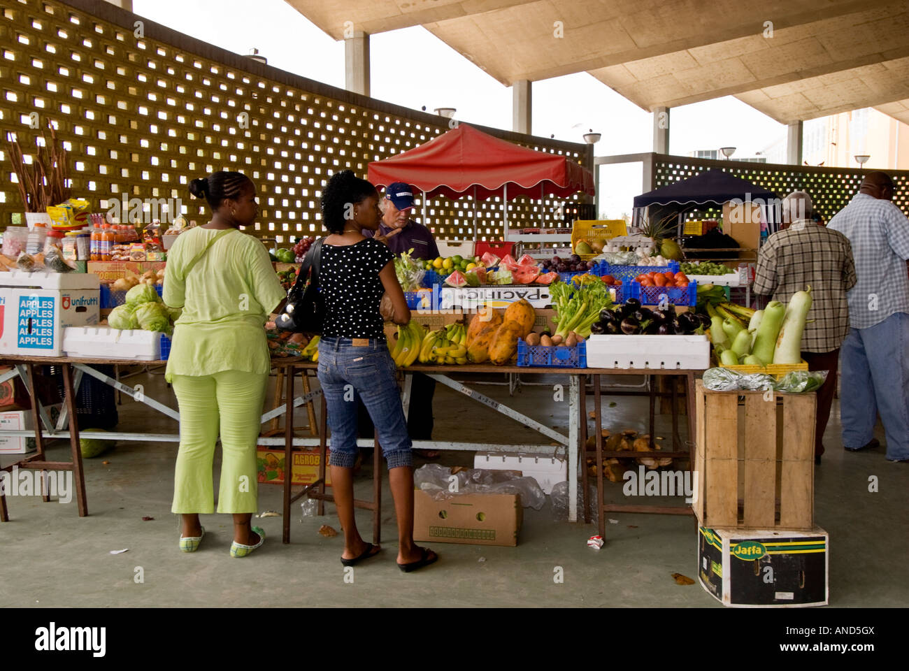 Customers waiting at the fruit stall in the Round Market, Punda ...