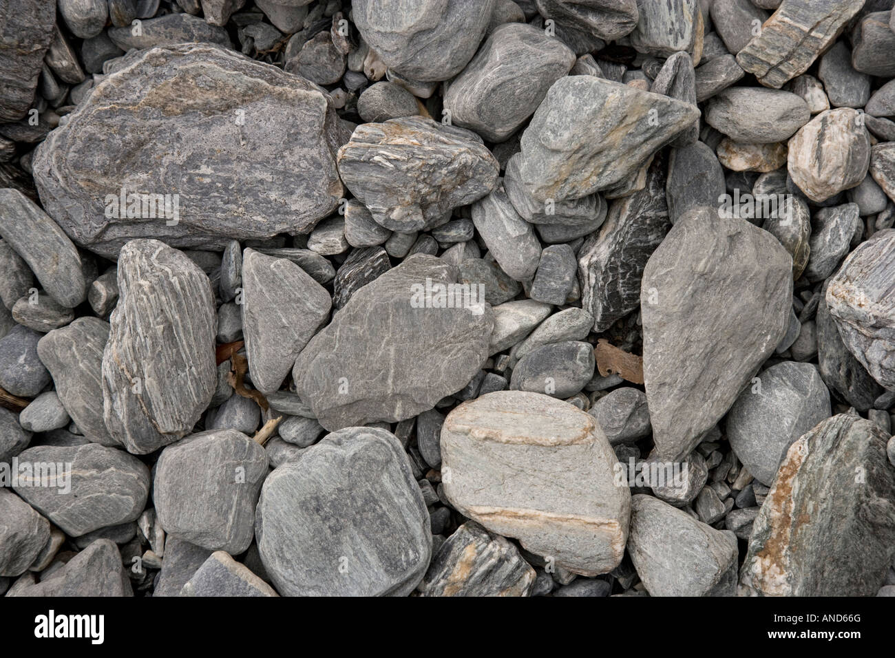 Naturally eroded river bed rock and stones Stock Photo - Alamy
