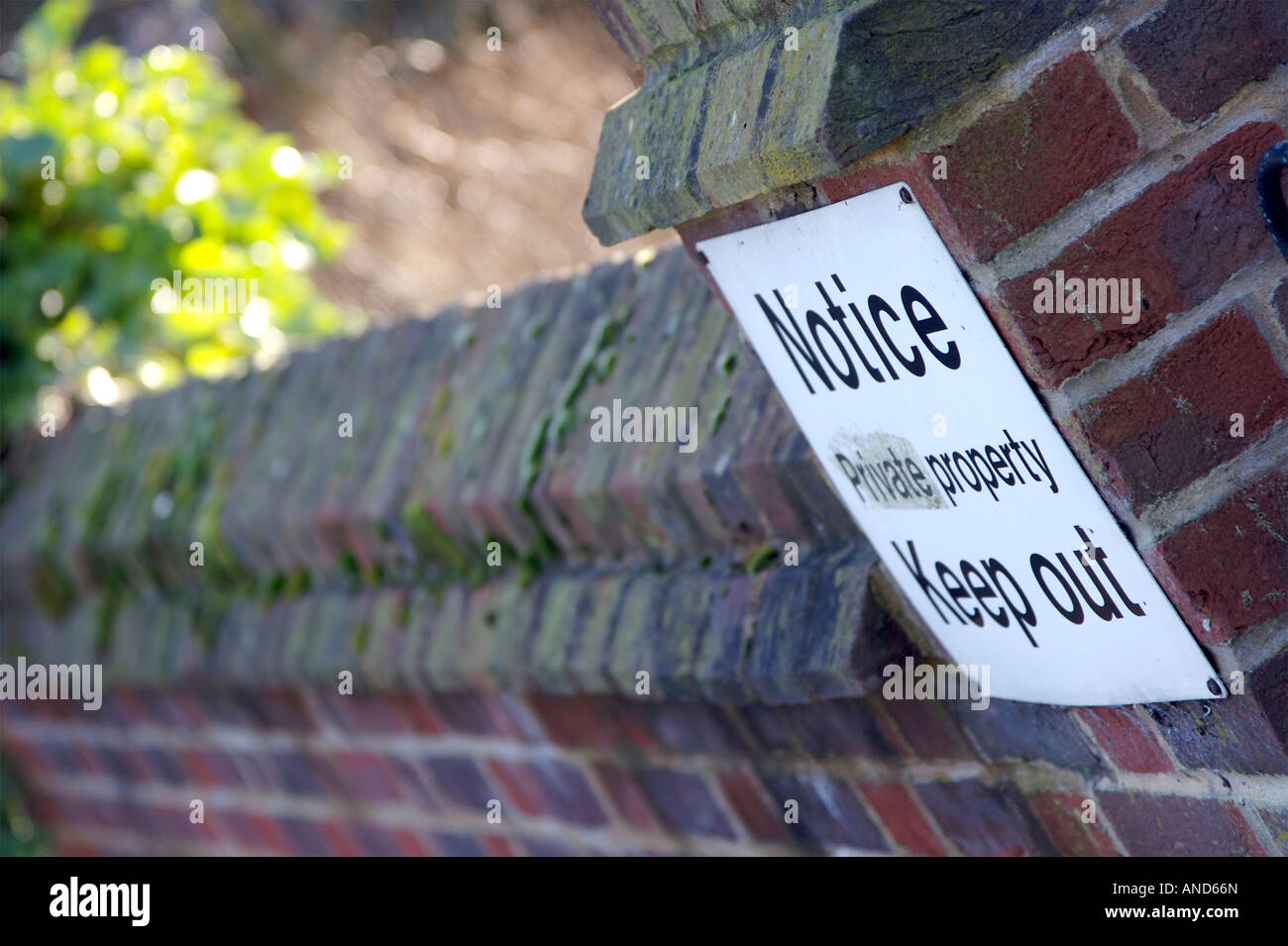 Keep Out Notice on a wall Stock Photo - Alamy