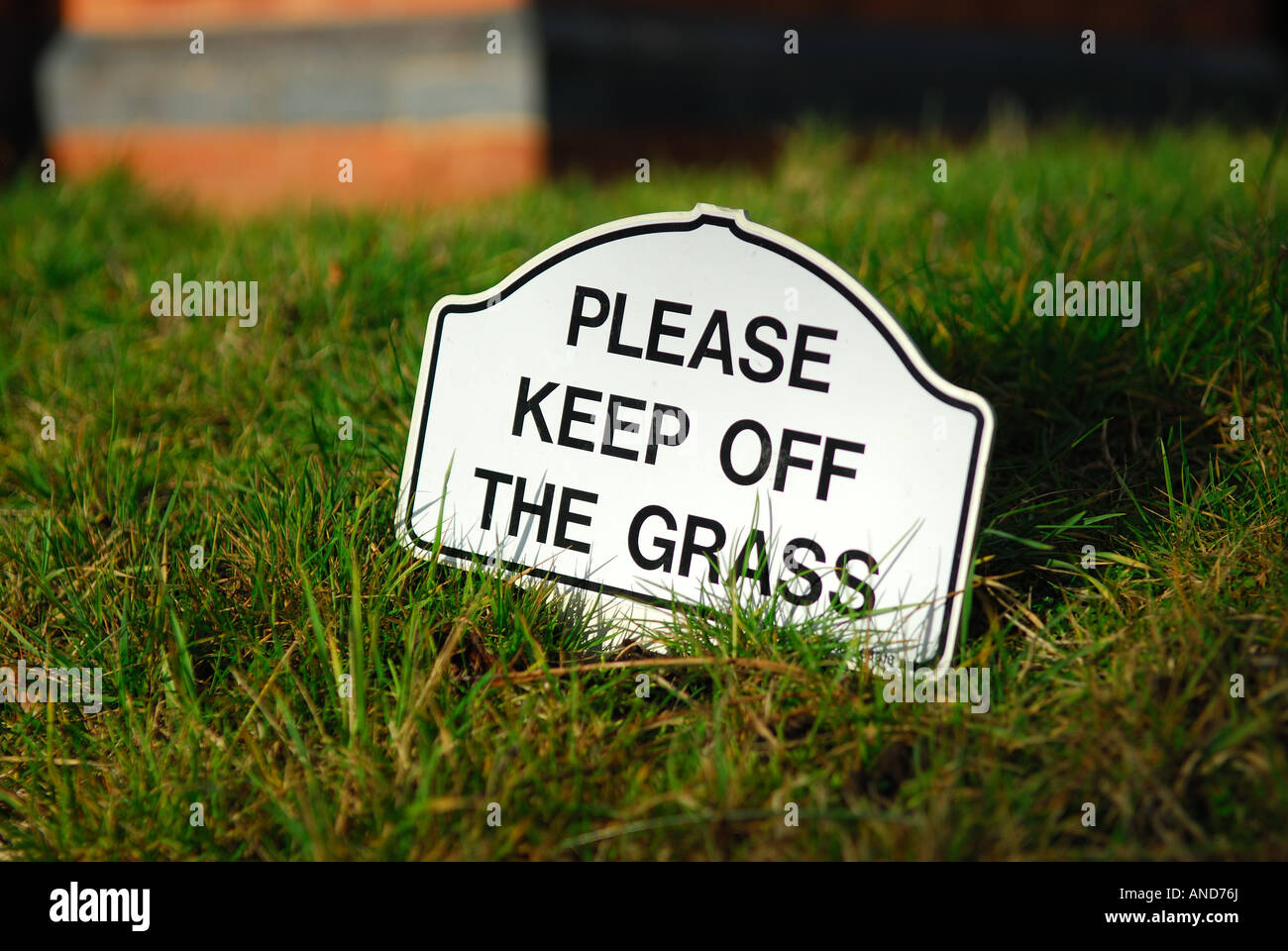 Keep off the grass sign on grass Stock Photo - Alamy