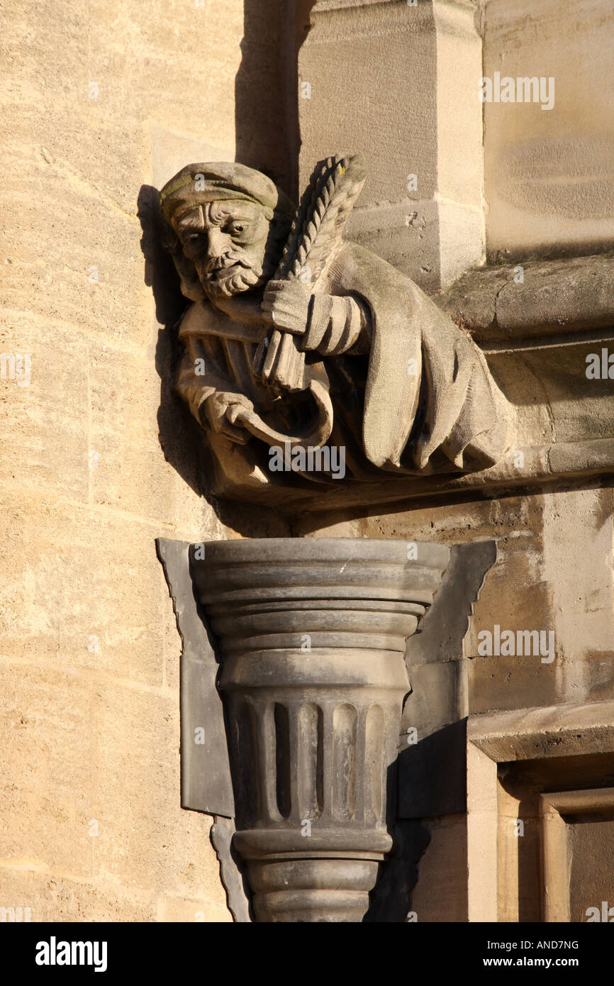 Farmer and drain gargoyle on Magdalen College, Oxford, UK Stock Photo ...