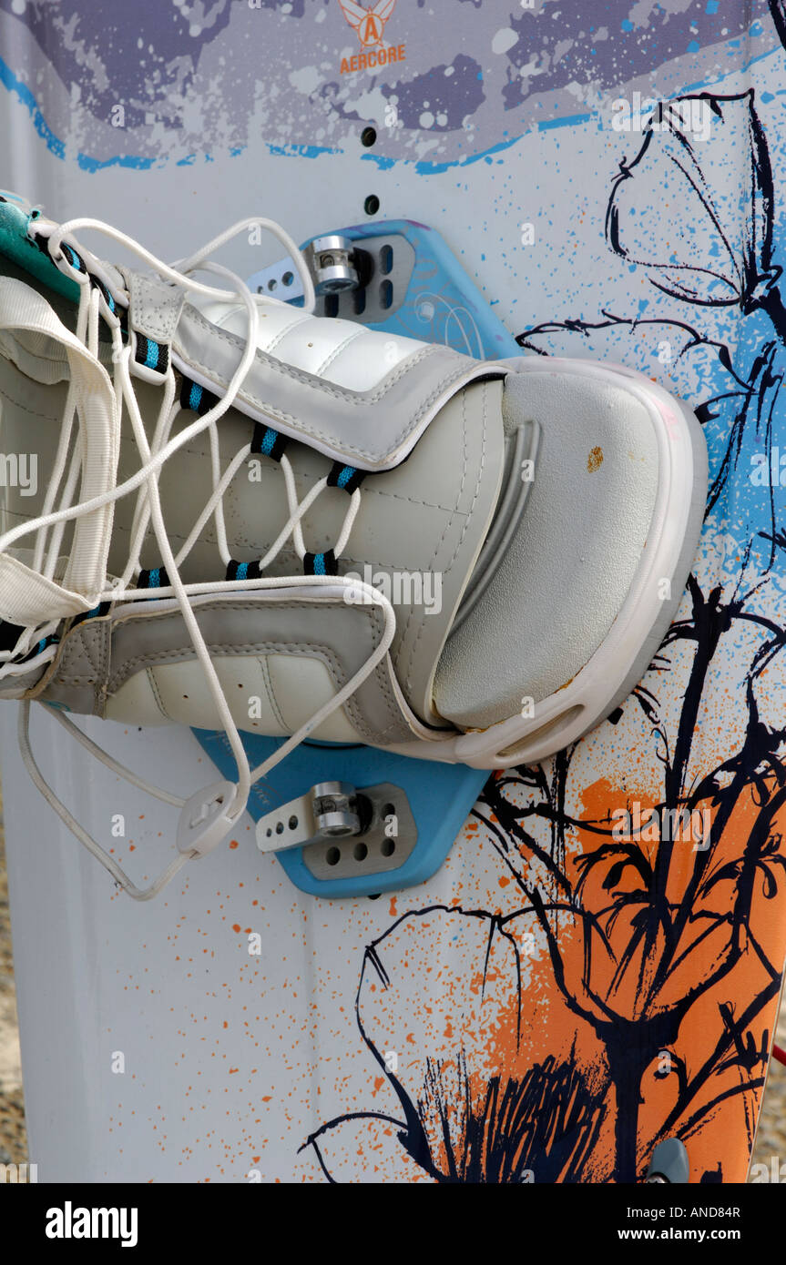 a training shoe standing on graffiti with laces undone untied Stock ...