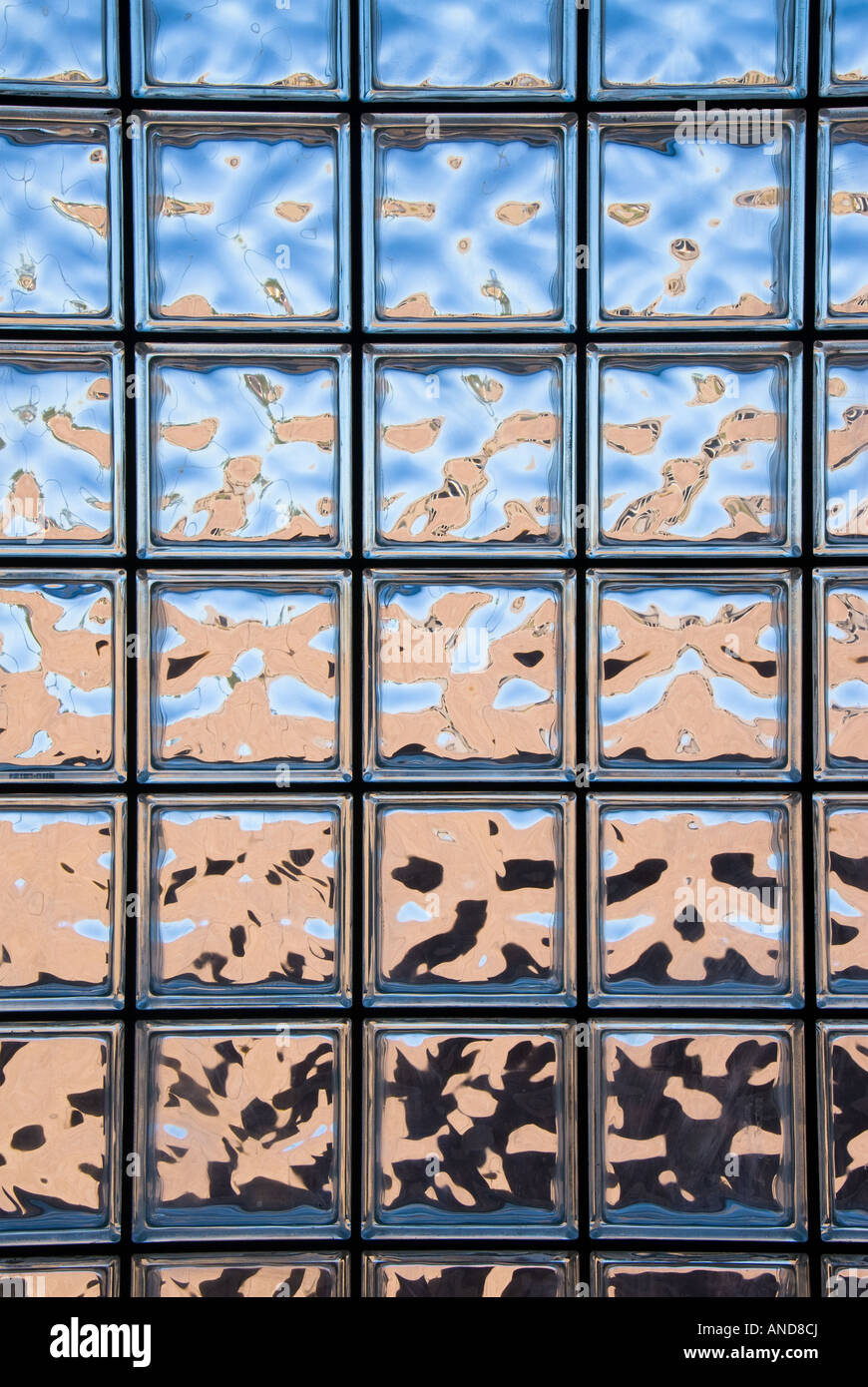 A glass block window looking outside of a custom home Stock Photo - Alamy