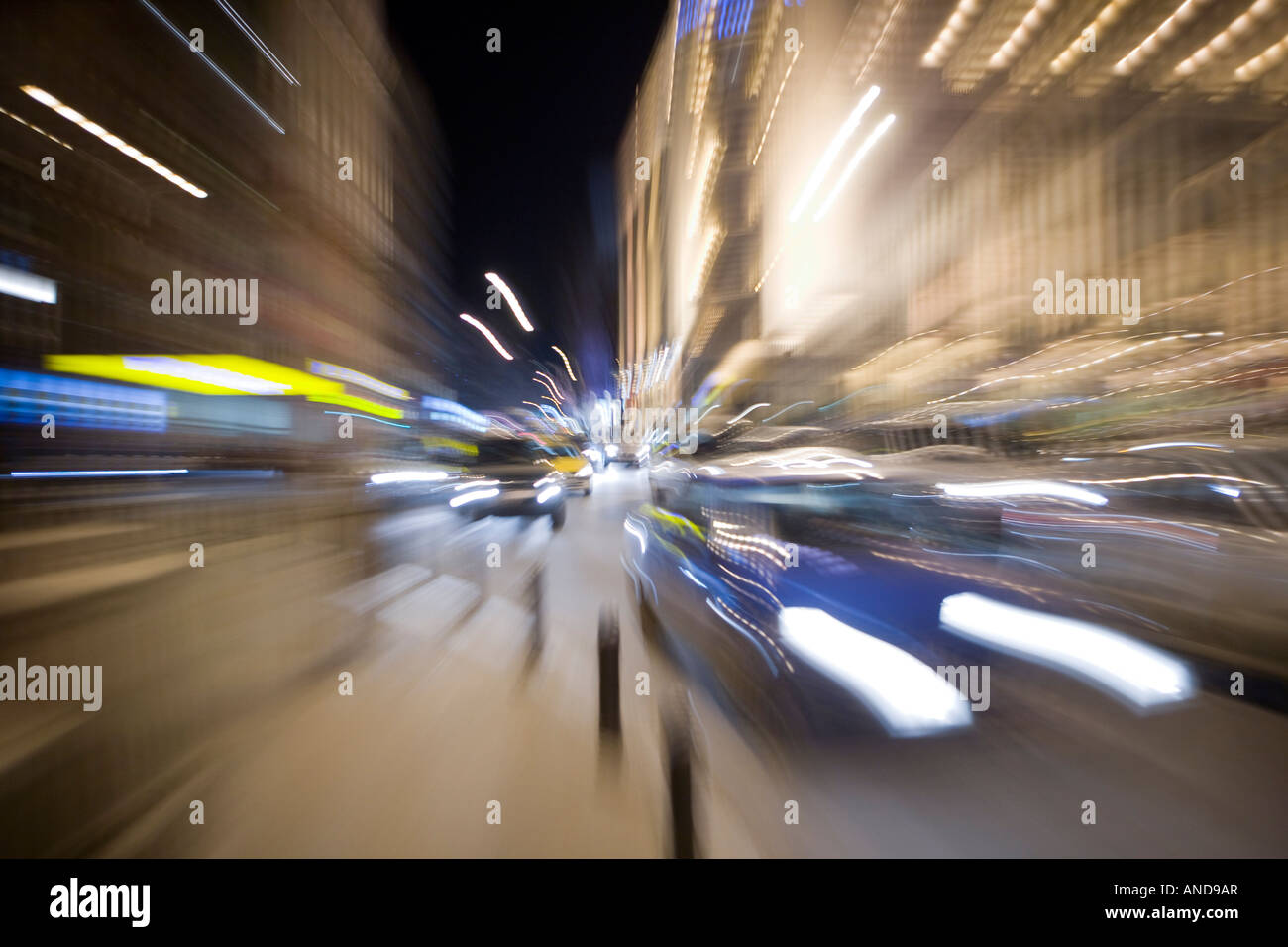 Night image with a car speeding, with zoom motion blur effect Stock ...