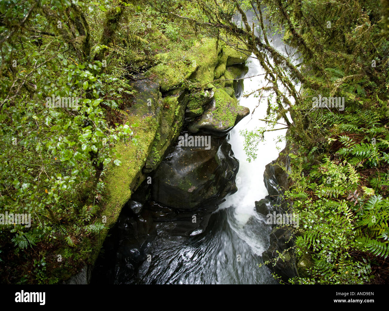 Rock formations made by a ferocious waterfall at The Chasm, Near ...