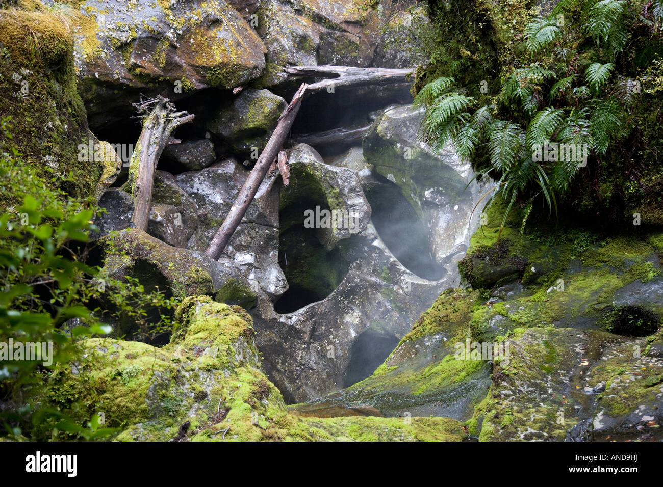 Rock formations made by a ferocious waterfall at The Chasm, Near ...