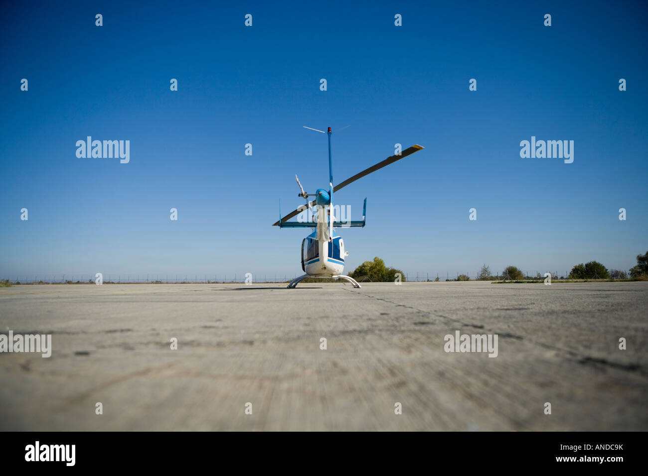 helicopter taking off from the landing track, rear view Stock Photo - Alamy