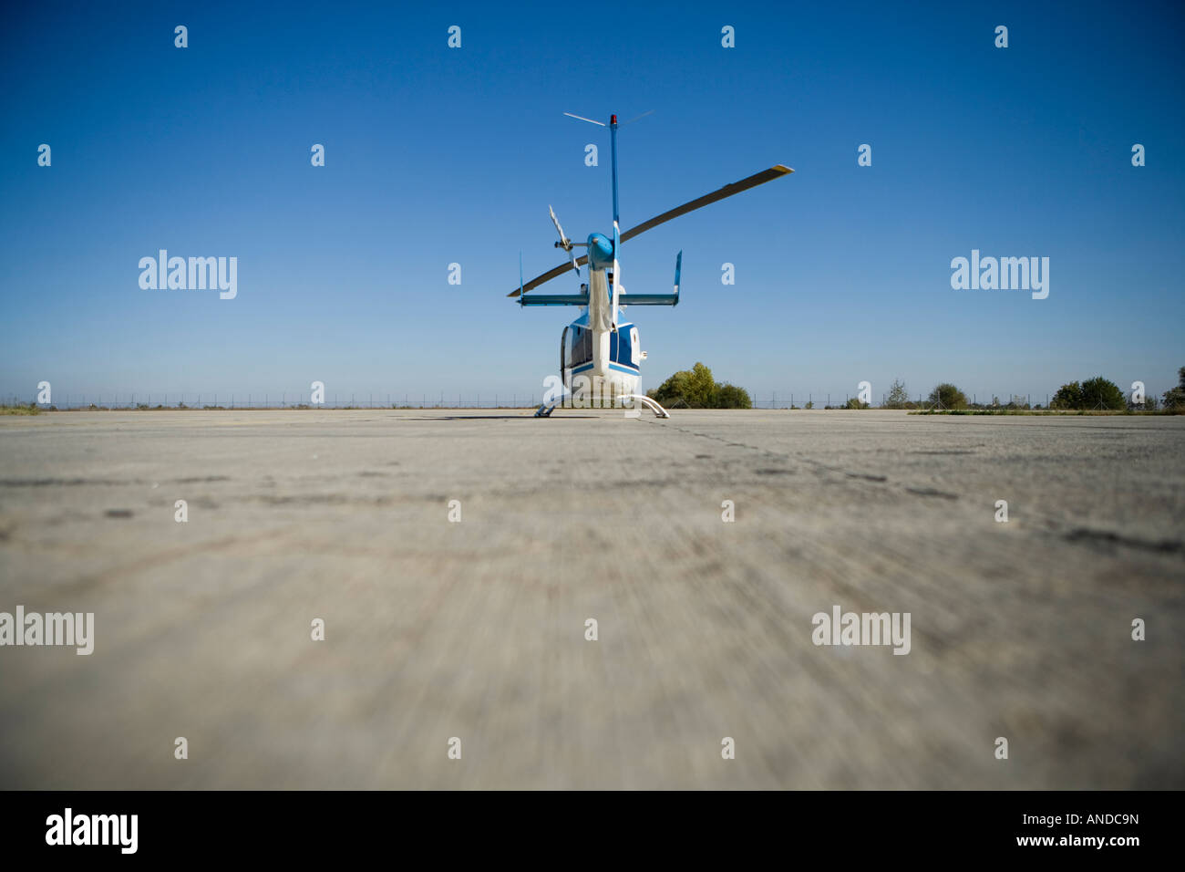 helicopter taking off from the landing track, rear view Stock Photo - Alamy