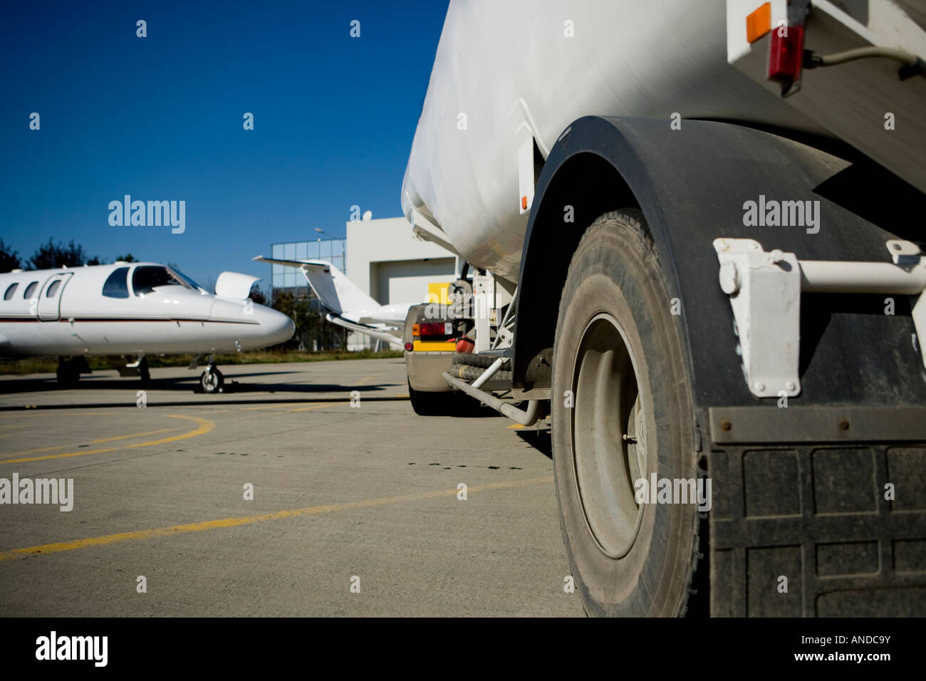 landing track with airplane and a trailer’s wheel Stock Photo - Alamy