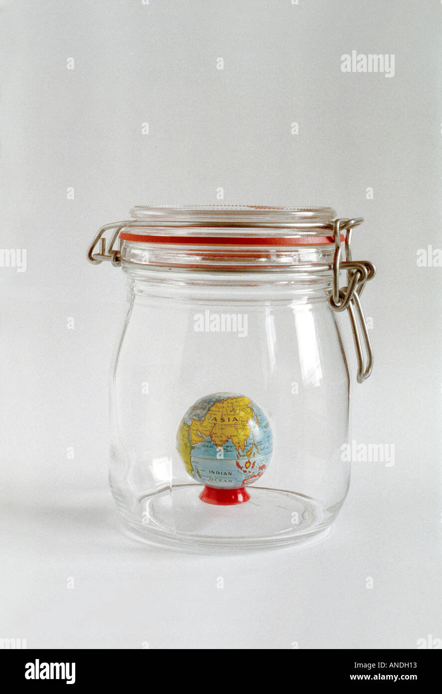 Globe in glass bottle's protection Stock Photo - Alamy