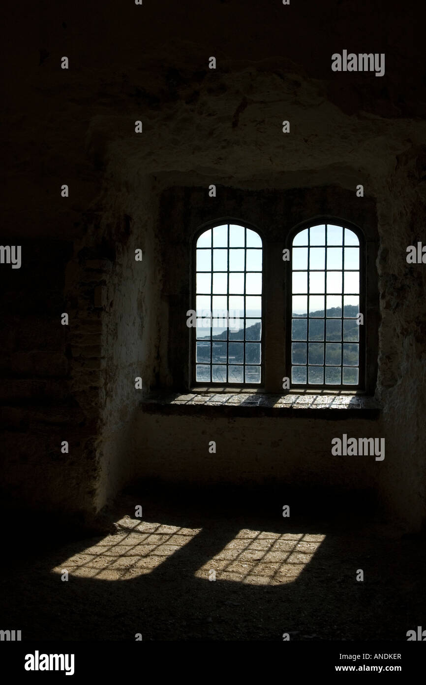 Castle windows with sunlight Stock Photo - Alamy