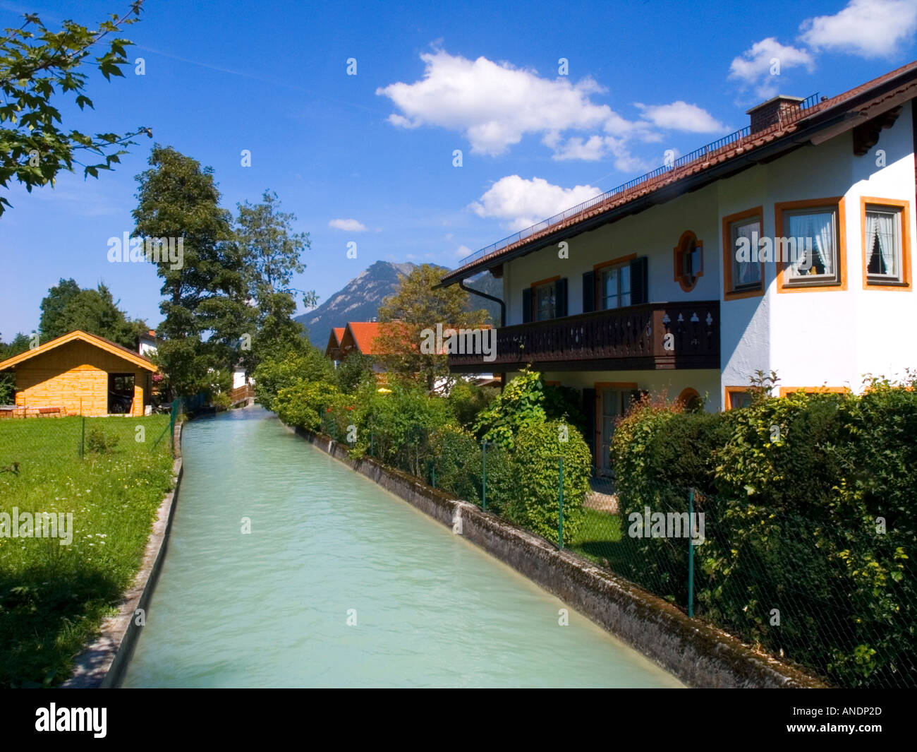 Canal waterway channel water run between houses in Mittenwald bavaria ...
