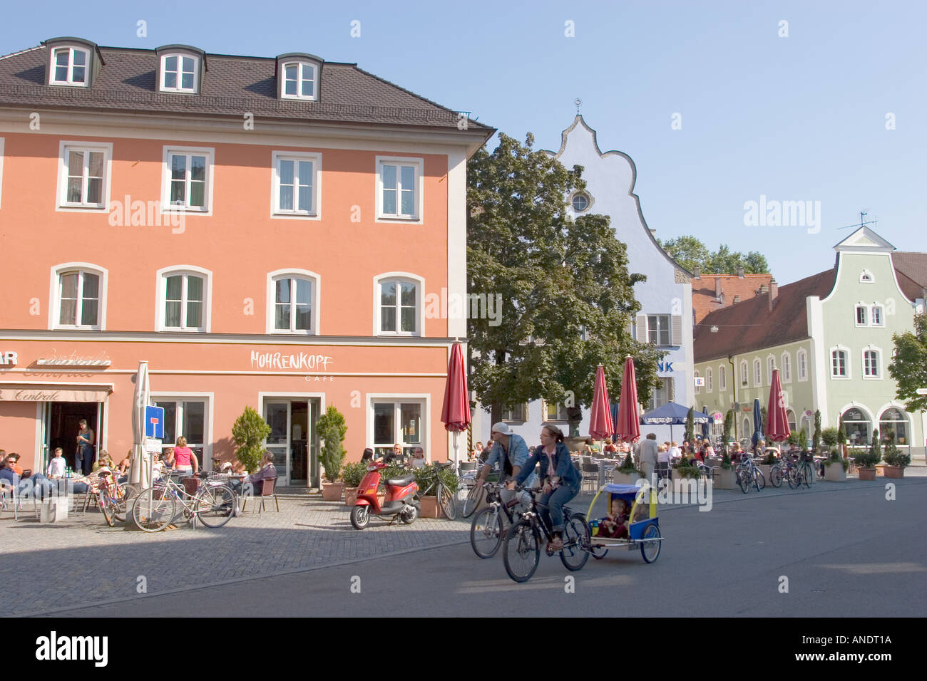 Cyclists in a street scene in the beautiful town of Ingolstadt on the ...