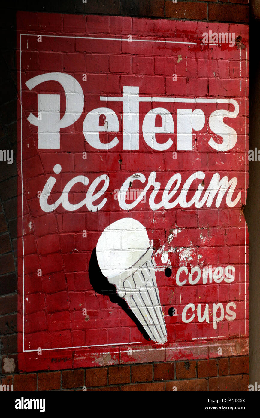 1930 s advertising signage on red brick wall in Sydney Australia Stock ...