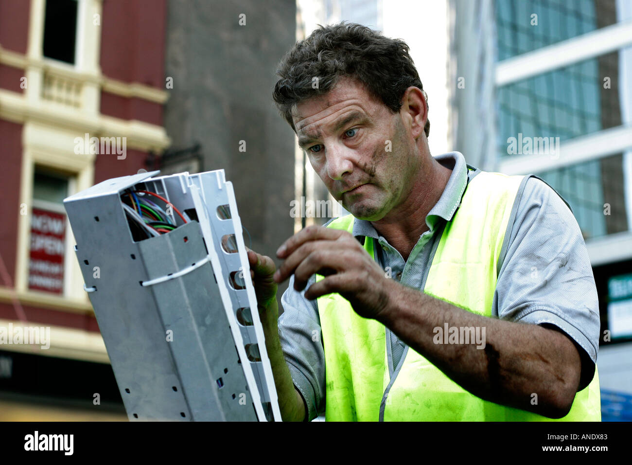 Optic fibre cable connection hub on City street Stock Photo - Alamy