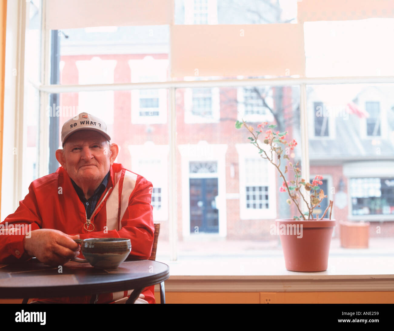 Old man in cafe Stock Photo - Alamy