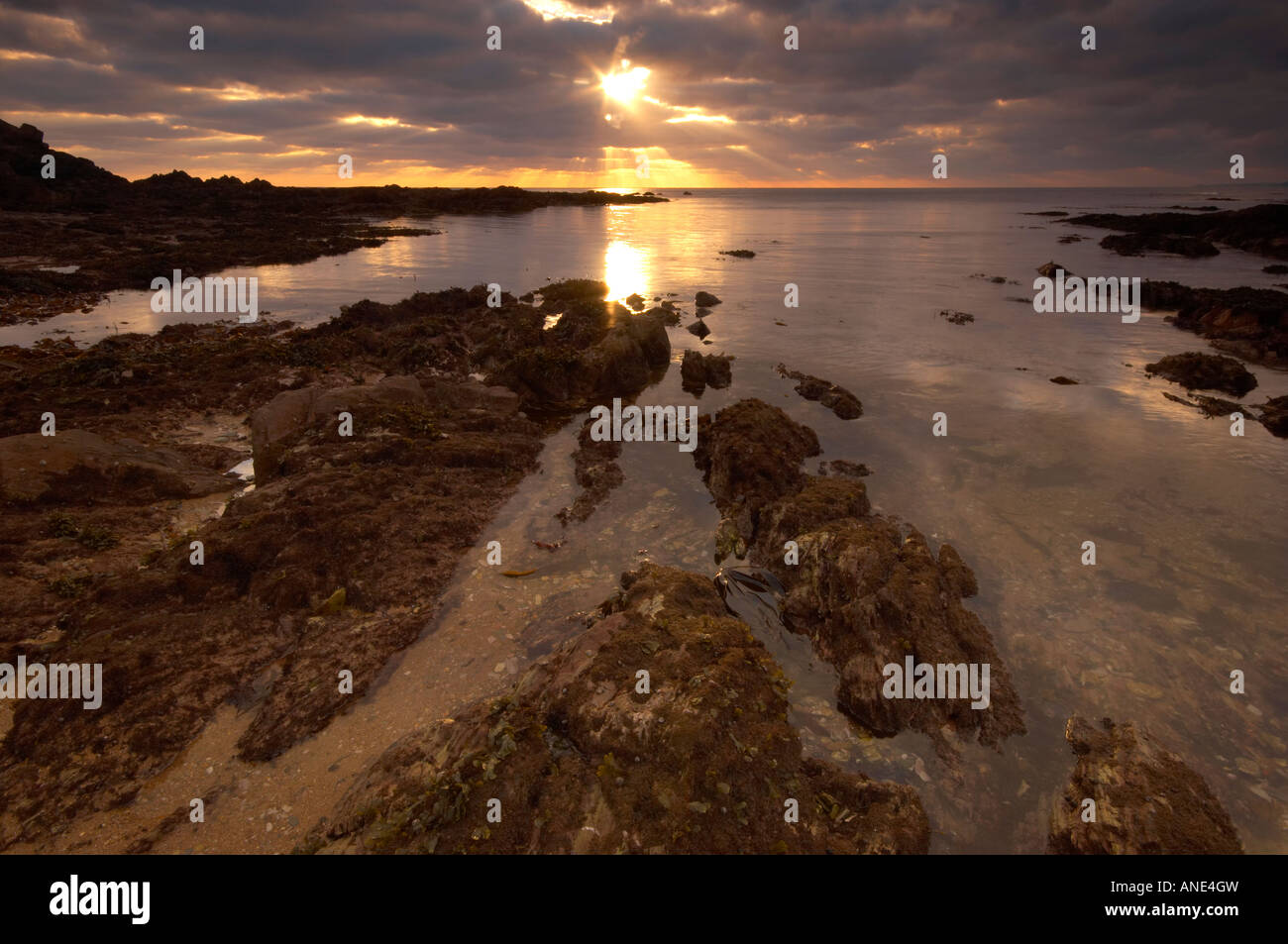 Sunset over Thurlestone cove Devon UK Stock Photo - Alamy