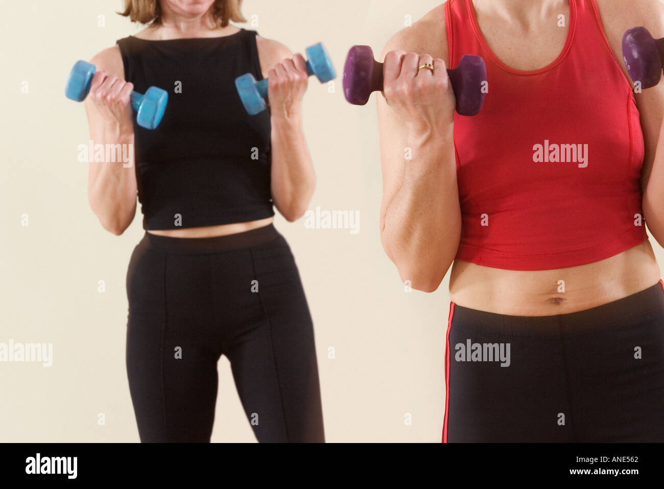 woman lifting hand weights during aerobics Stock Photo - Alamy