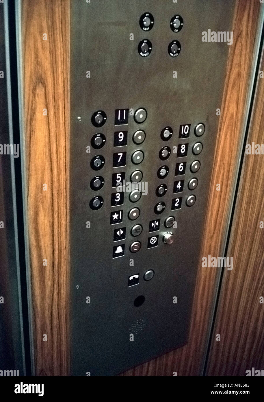 Elevator buttons on control panel Stock Photo - Alamy