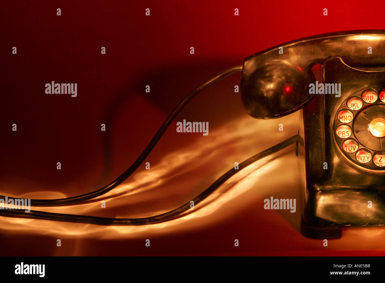 red and yellow telephone and cord Stock Photo - Alamy