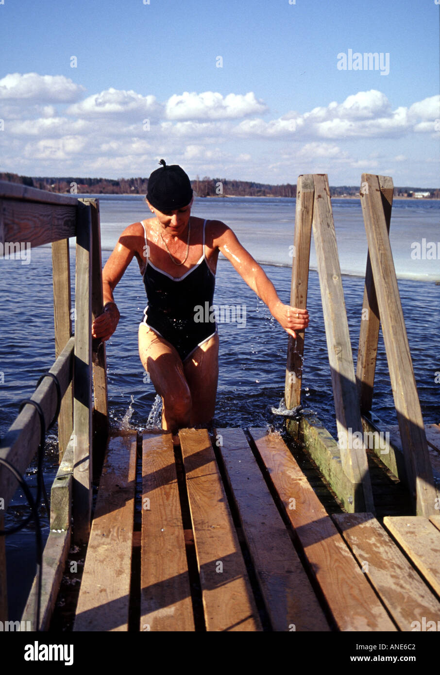 Finland Ice hole swimmer Stock Photo - Alamy