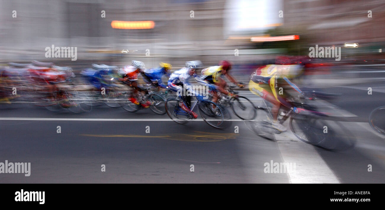 Speed Bike racers racing through a city street Stock Photo - Alamy