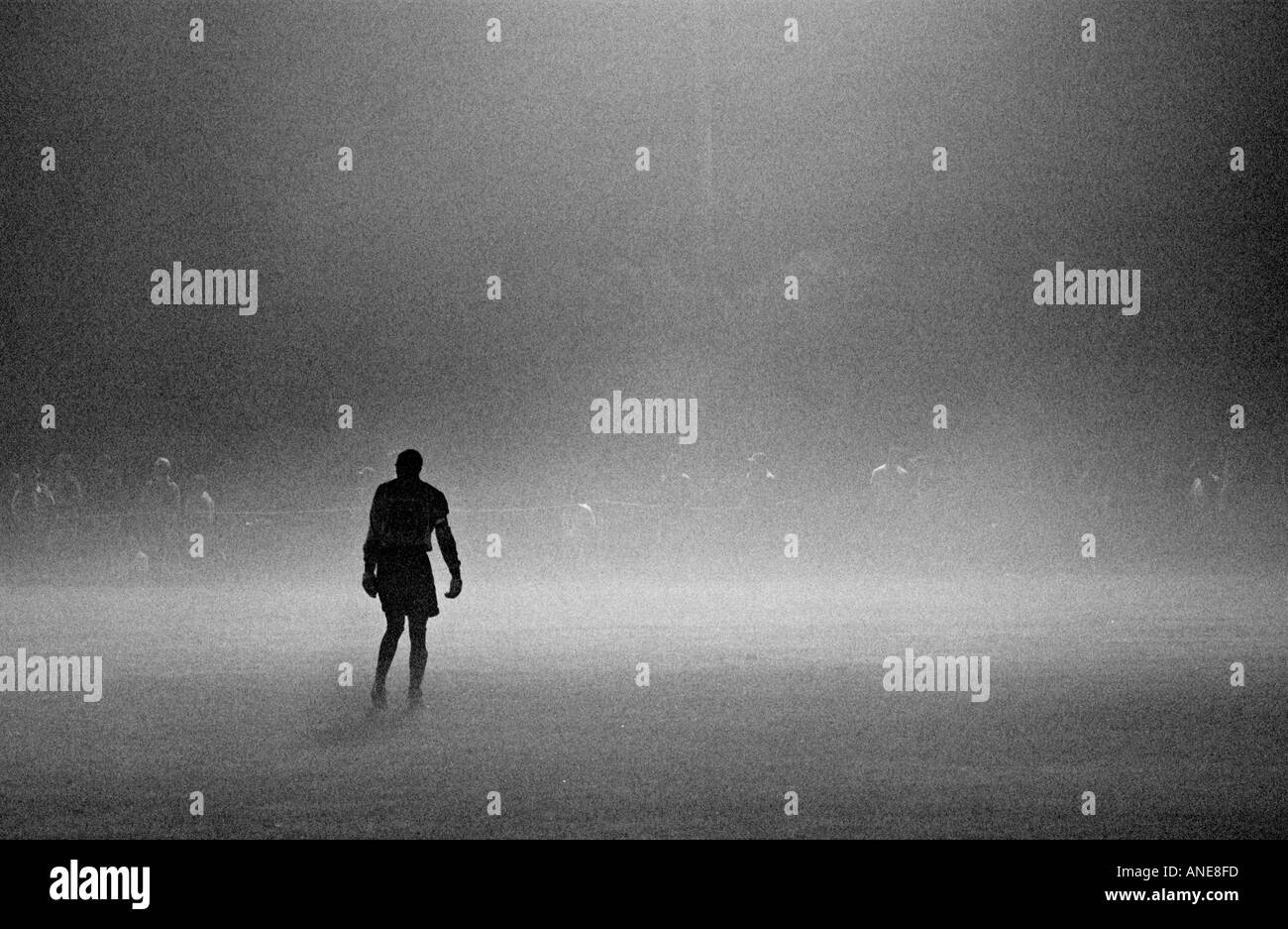 Goalie in the fog during a football match Stock Photo - Alamy