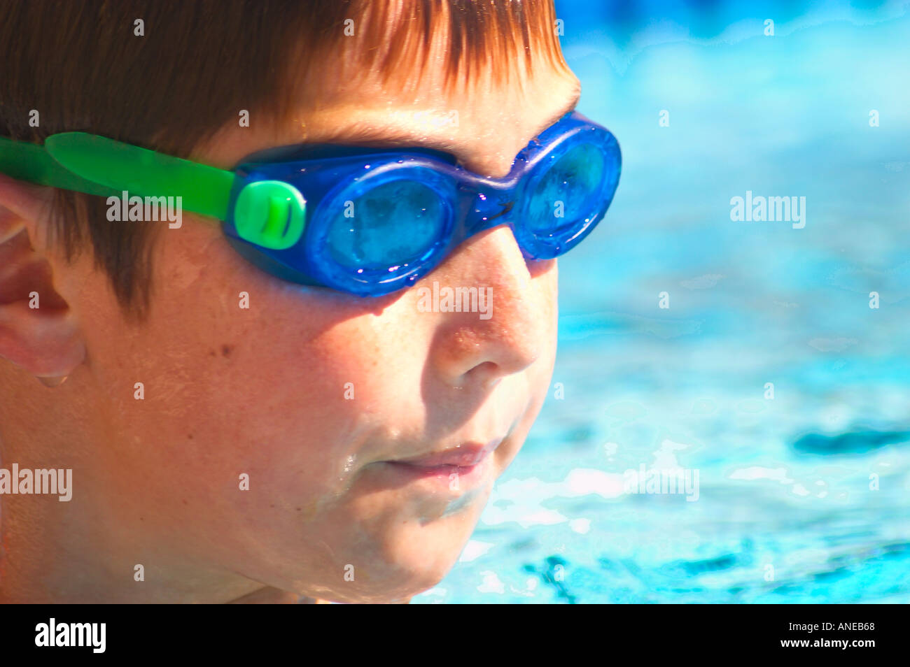 boy with goggles on in swimmong pool Stock Photo - Alamy