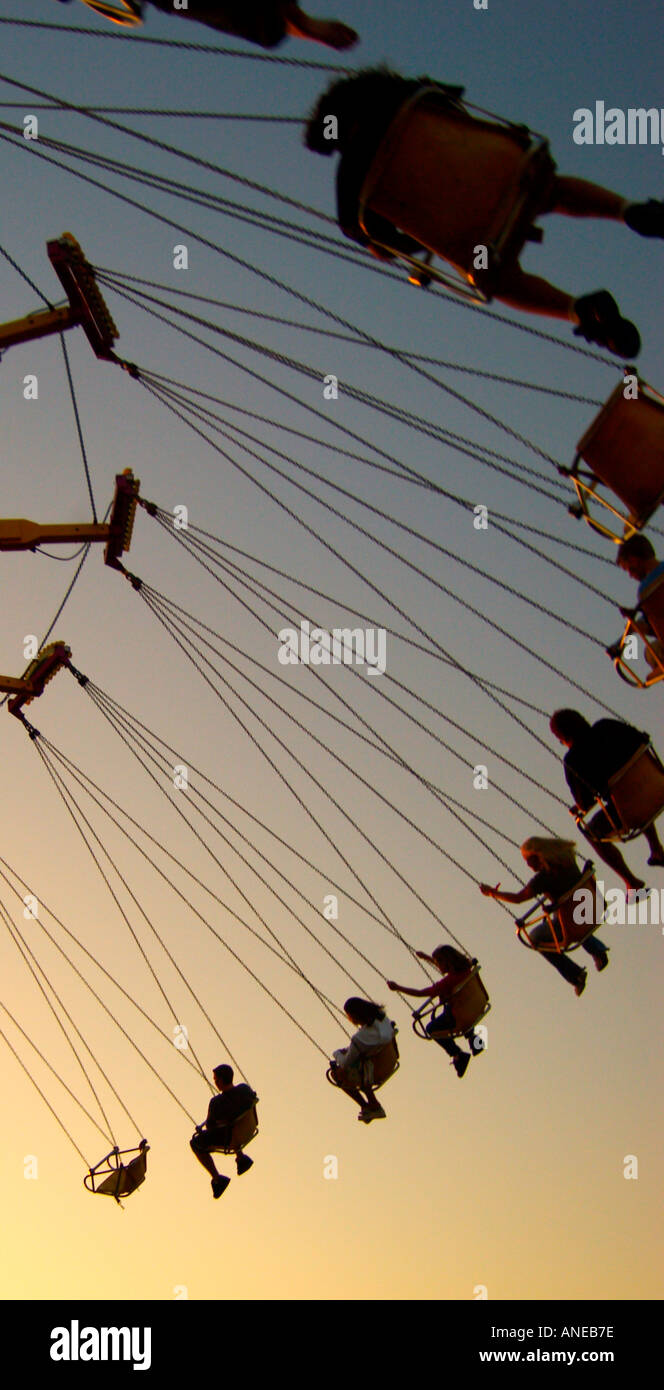 carnival swing ride Stock Photo - Alamy