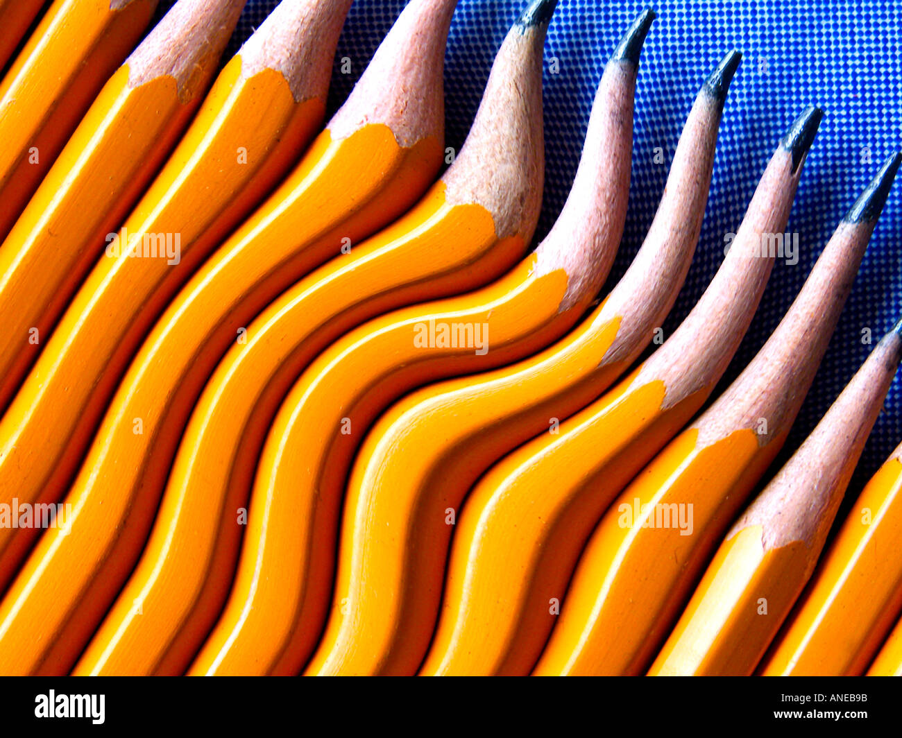 sharp yellow school pencils illusion Stock Photo - Alamy