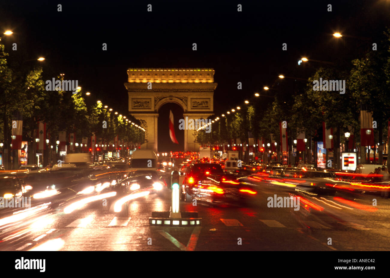 "Champs Elysees Paris" at night in rush hour Stock Photo - Alamy