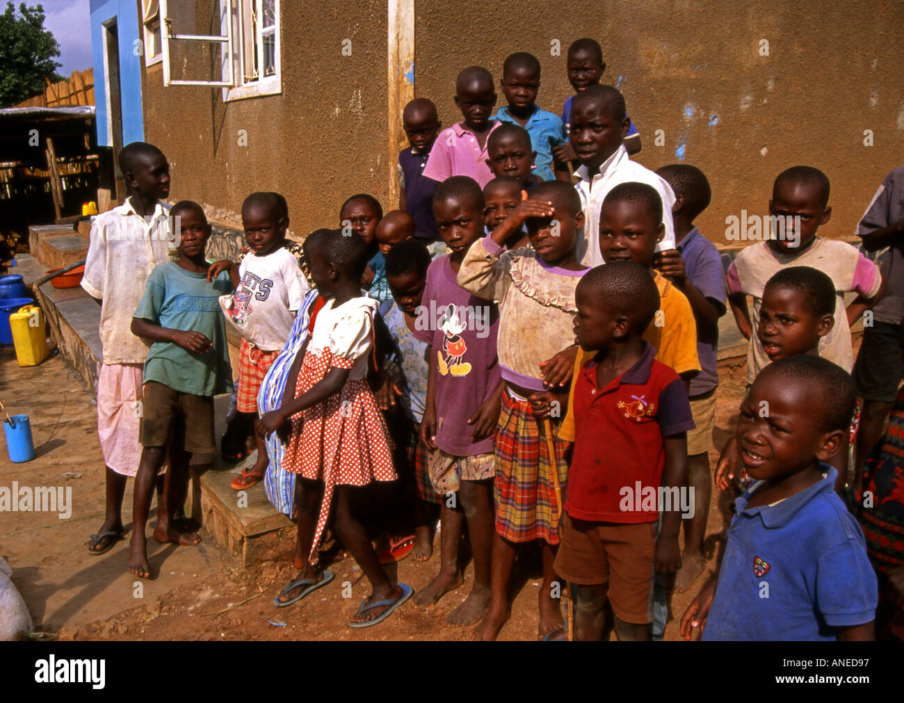 Portrait group indigenous orphan school boy girl pose stand outdoor ...