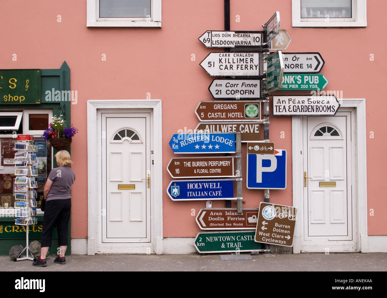 Road Signs between two house doors. Ballyvaughan, County Clare, Ireland ...
