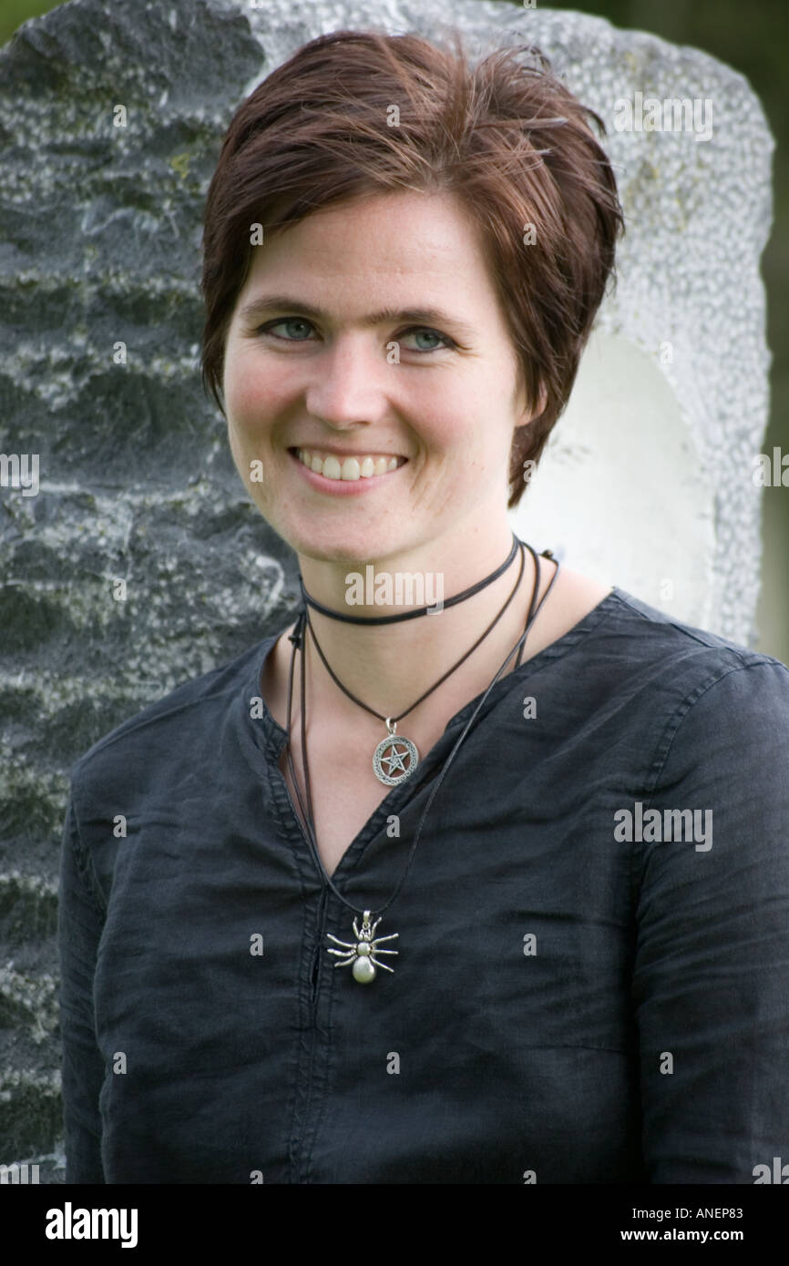 German Goth Girl wearing black shirt and silver spider necklace Stock ...
